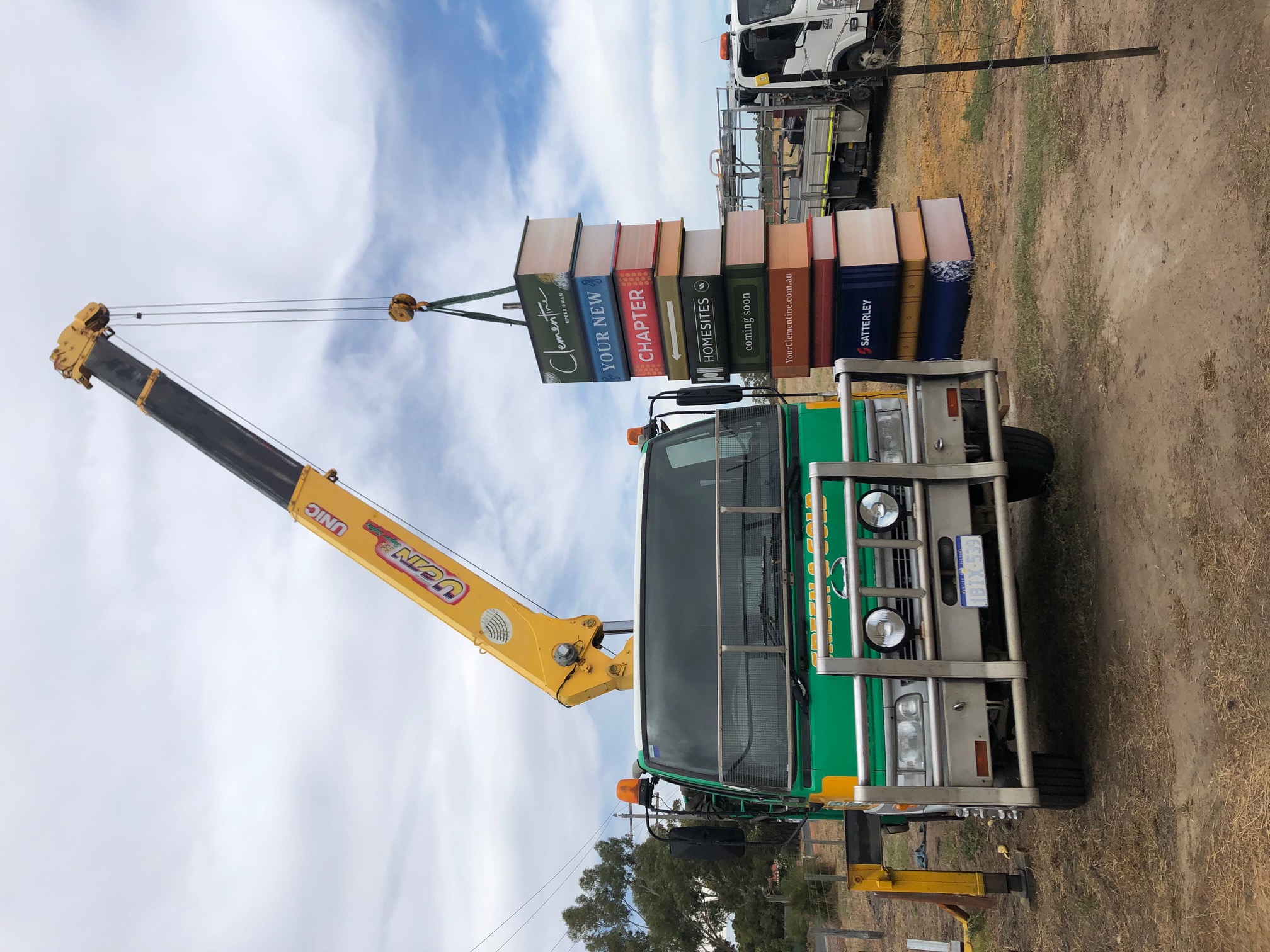 New Estate Sign Installs with Green & Gold Hiab - Green and Gold Hiab Hire