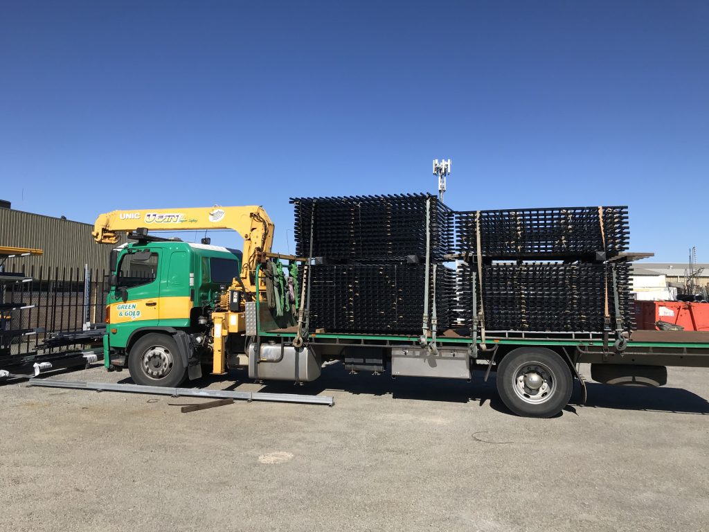Fencing Delivery For CAI FENCES - Green and Gold Hiab Hire